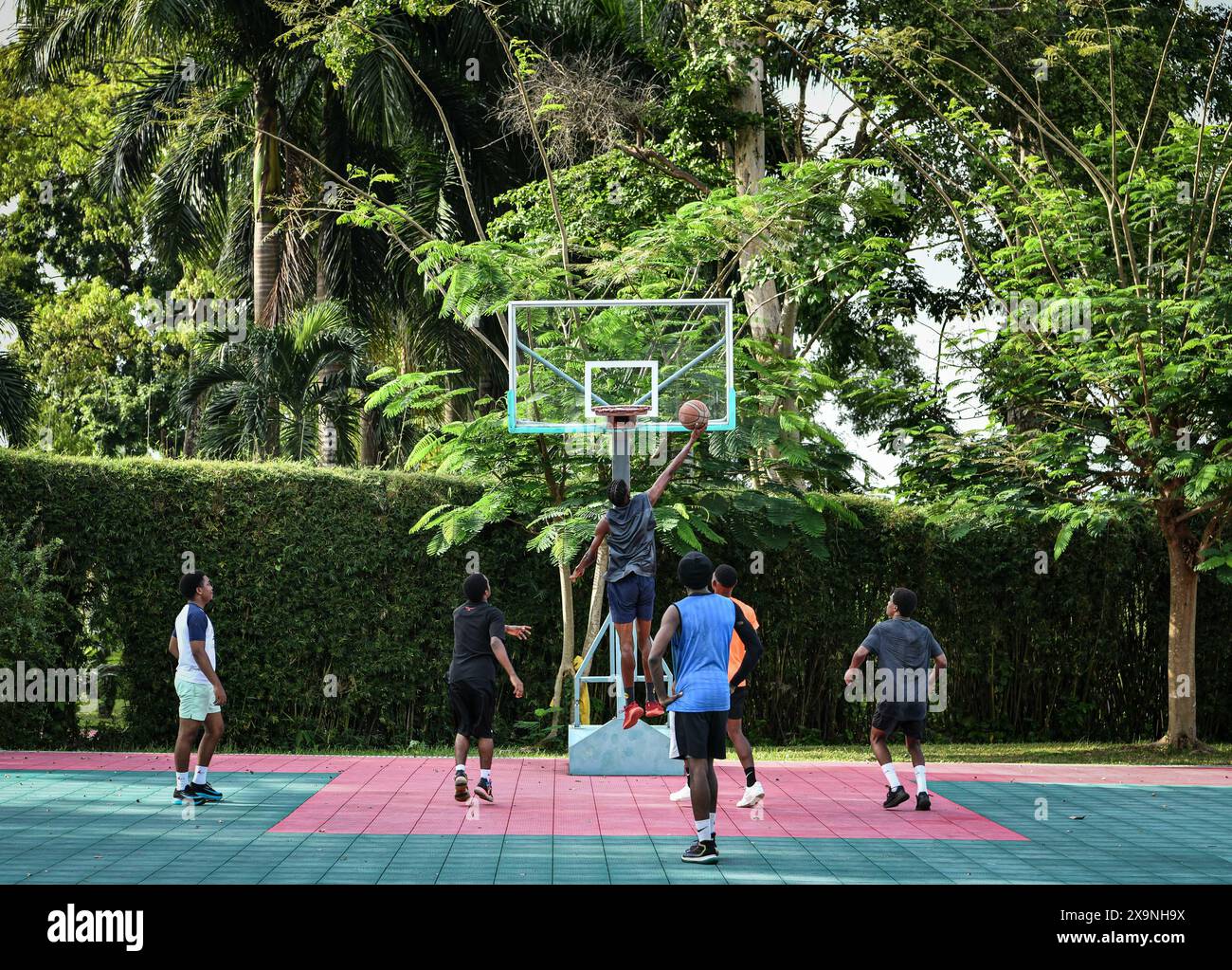 Malabo, Equatorial Guinea. 19th May, 2024. People play basketball at ...