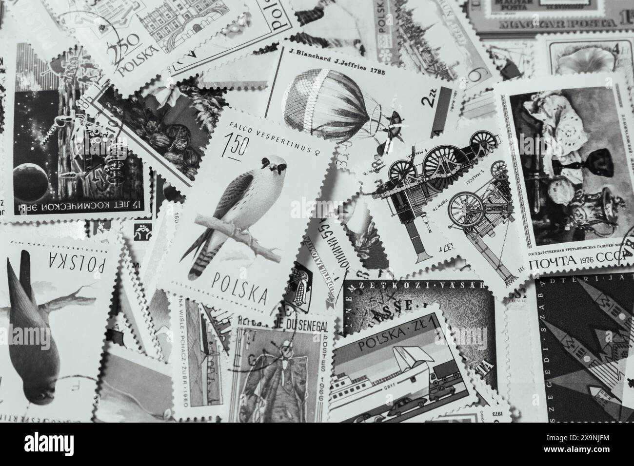 A collection of postage stamps from various countries. The stamps are ...