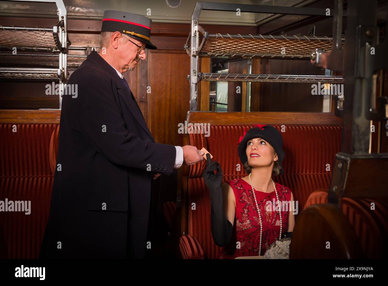 Reenactment scene of a vintage steam train conductor in a 1927 ...