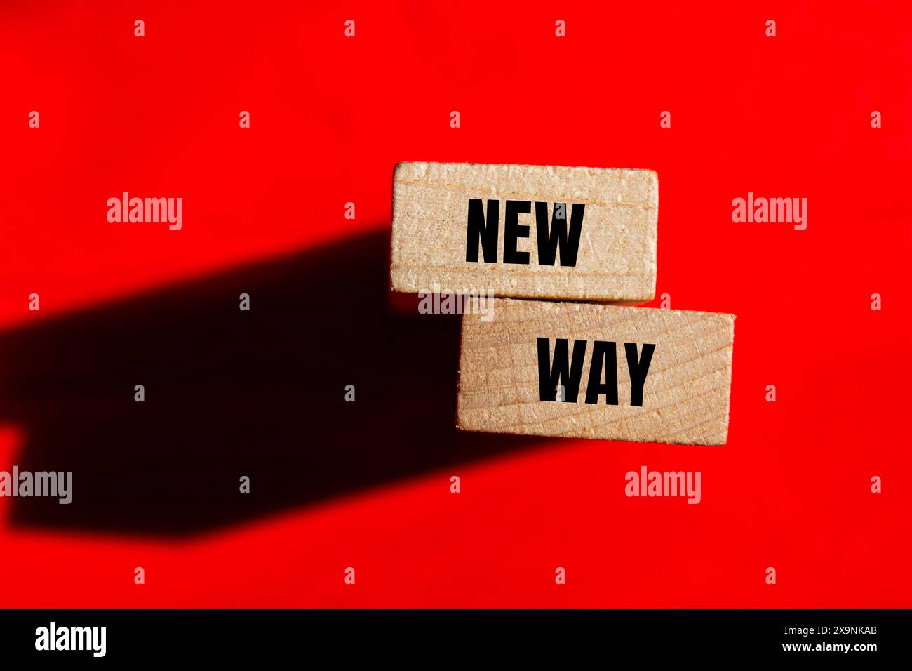 New way words written on wooden blocks with red background. Conceptual ...