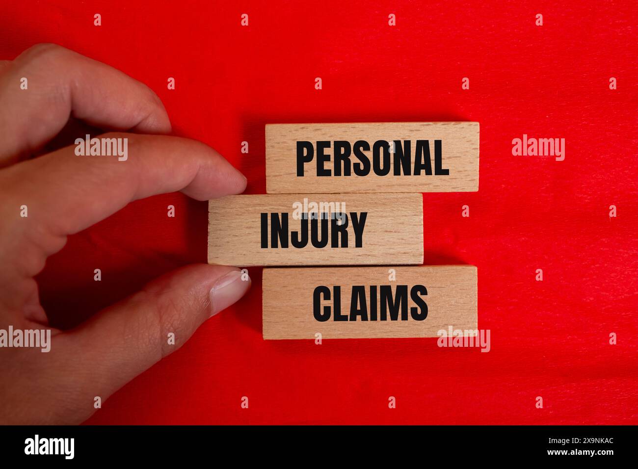 Personal injury claims message written on wooden blocks with color ...