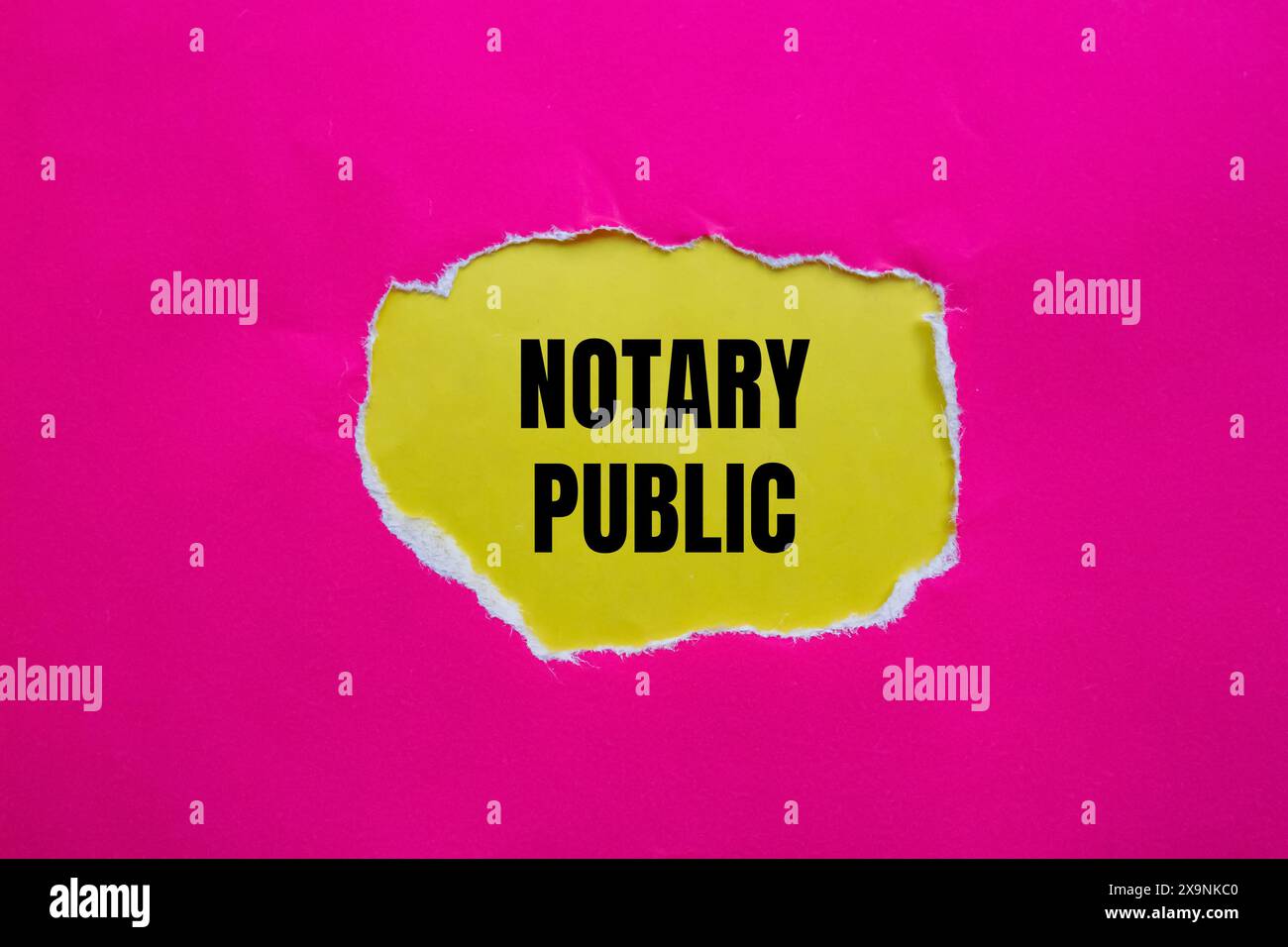 Notary public words written on ripped pink paper with yellow background ...