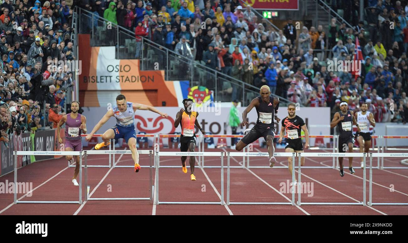 Karsten Warholm of Norway and Alison Dos Santos of Brazil competing in ...