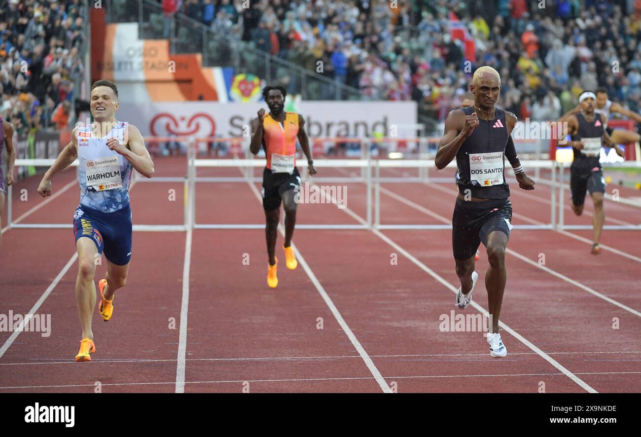 Karsten Warholm of Norway and Alison Dos Santos of Brazil competing in ...
