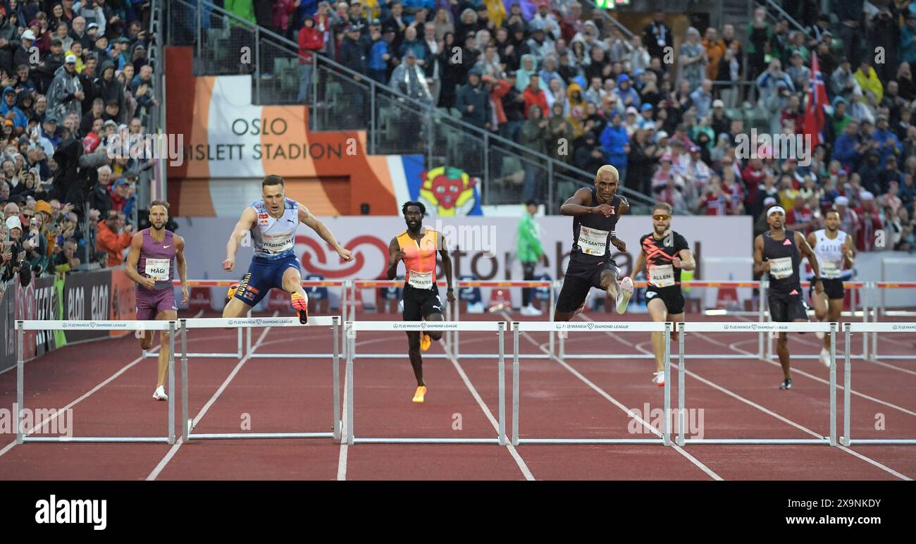 Karsten Warholm of Norway and Alison Dos Santos of Brazil competing in ...