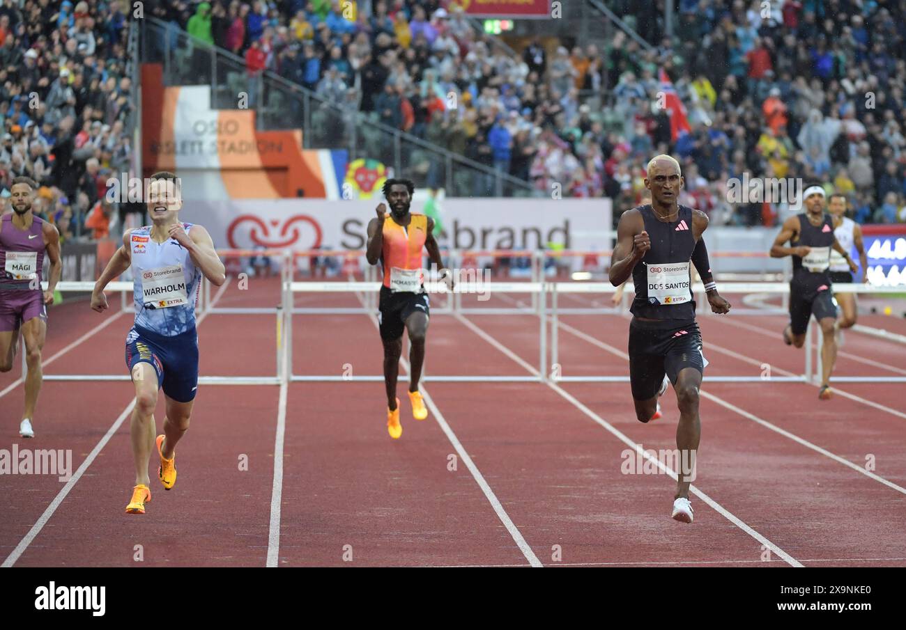 Karsten Warholm of Norway and Alison Dos Santos of Brazil competing in ...