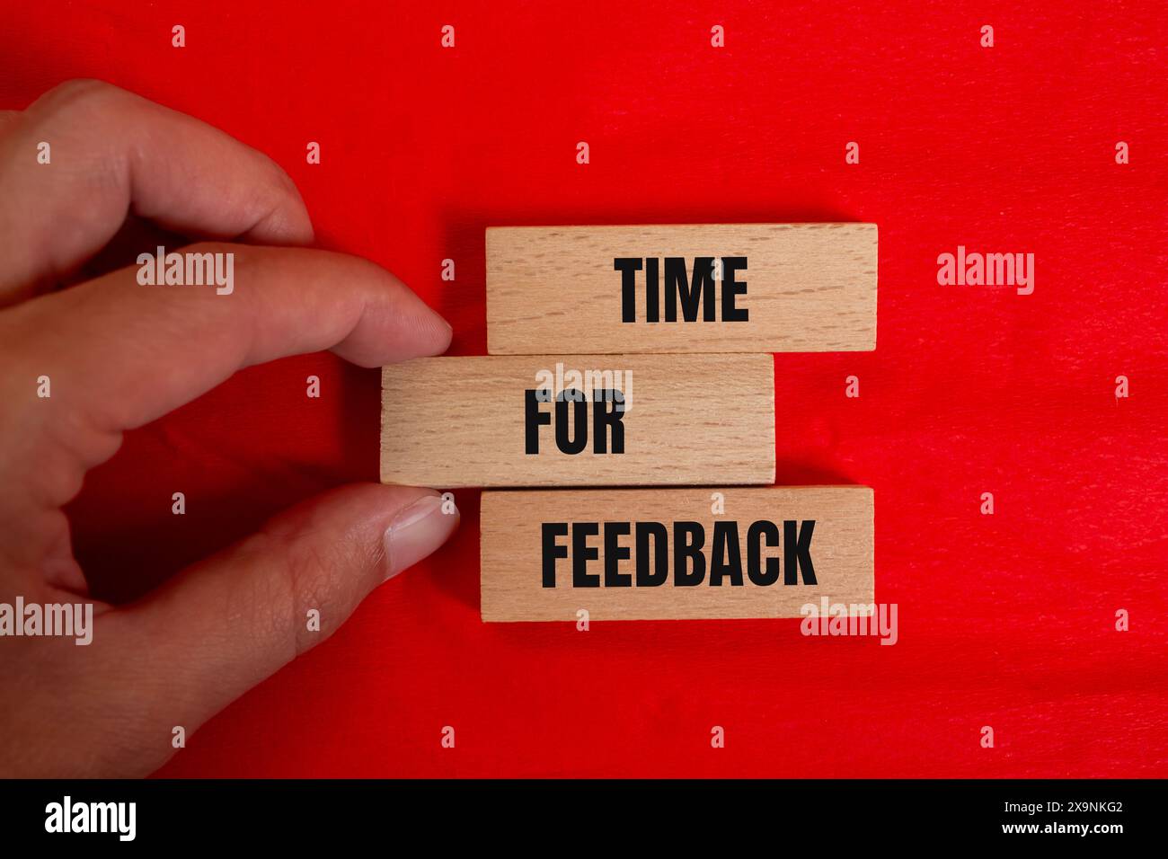 Time for feedback message written on wooden blocks with color ...