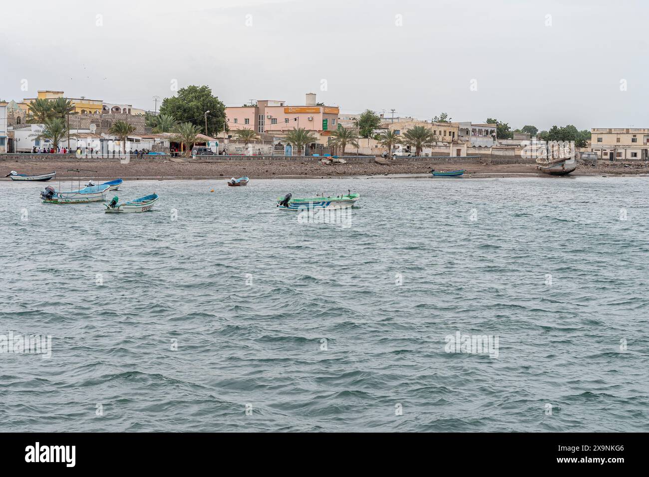 Waterfront of Tadjoura with beach, boats and people, Republic of ...