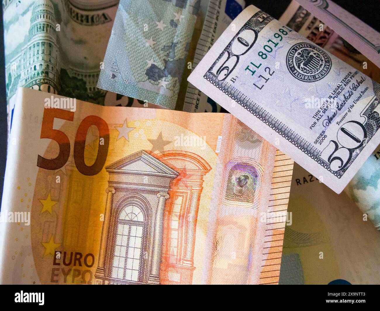 Money Details. A close-up of the intricate designs on a Euro and Dollar ...