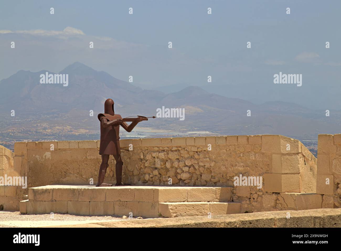 Archer statue at Santa Barbara castle protecting Alicante Stock Photo ...