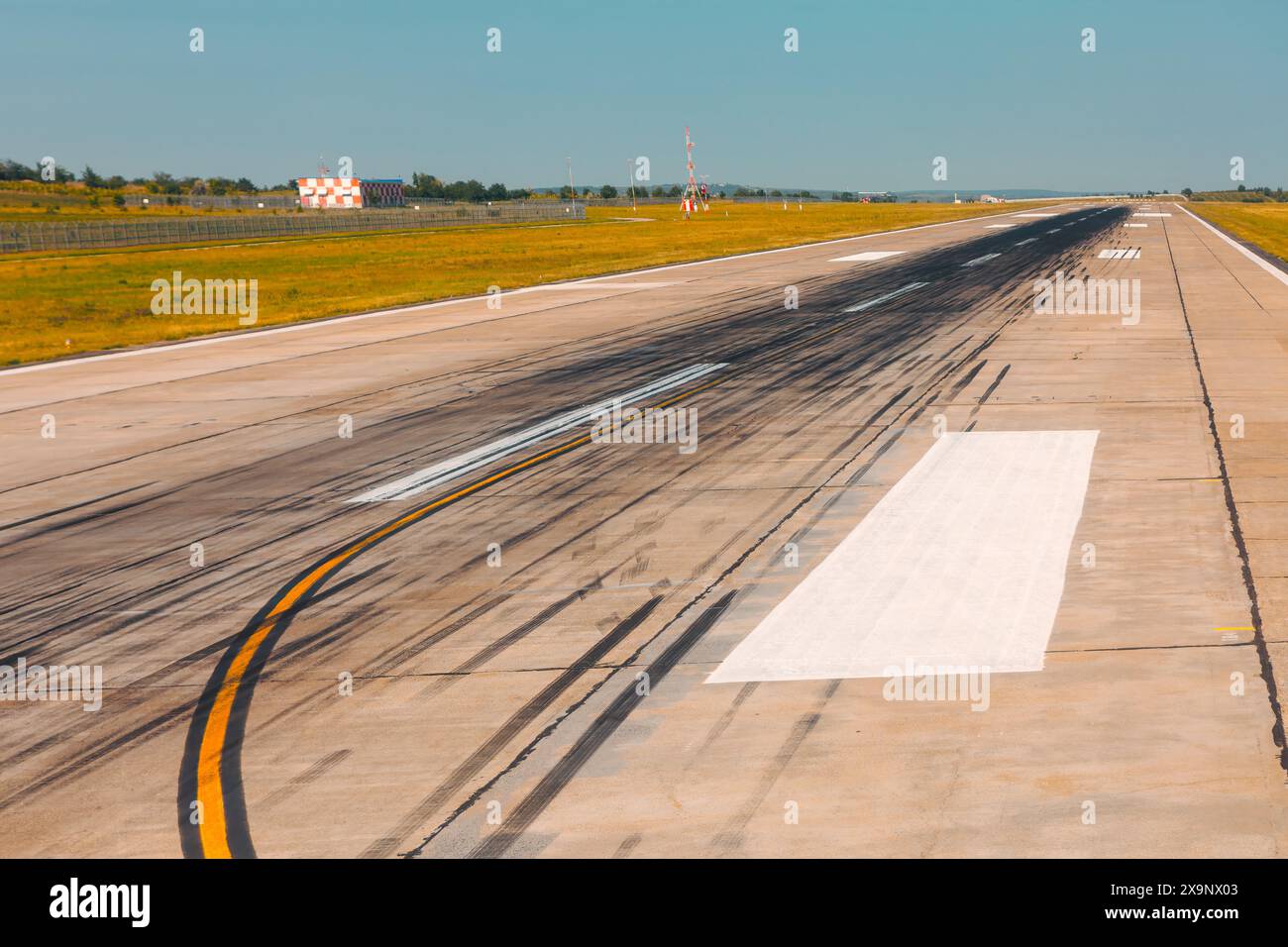 Brake marks on runway. Skid marks after landing Stock Photo - Alamy