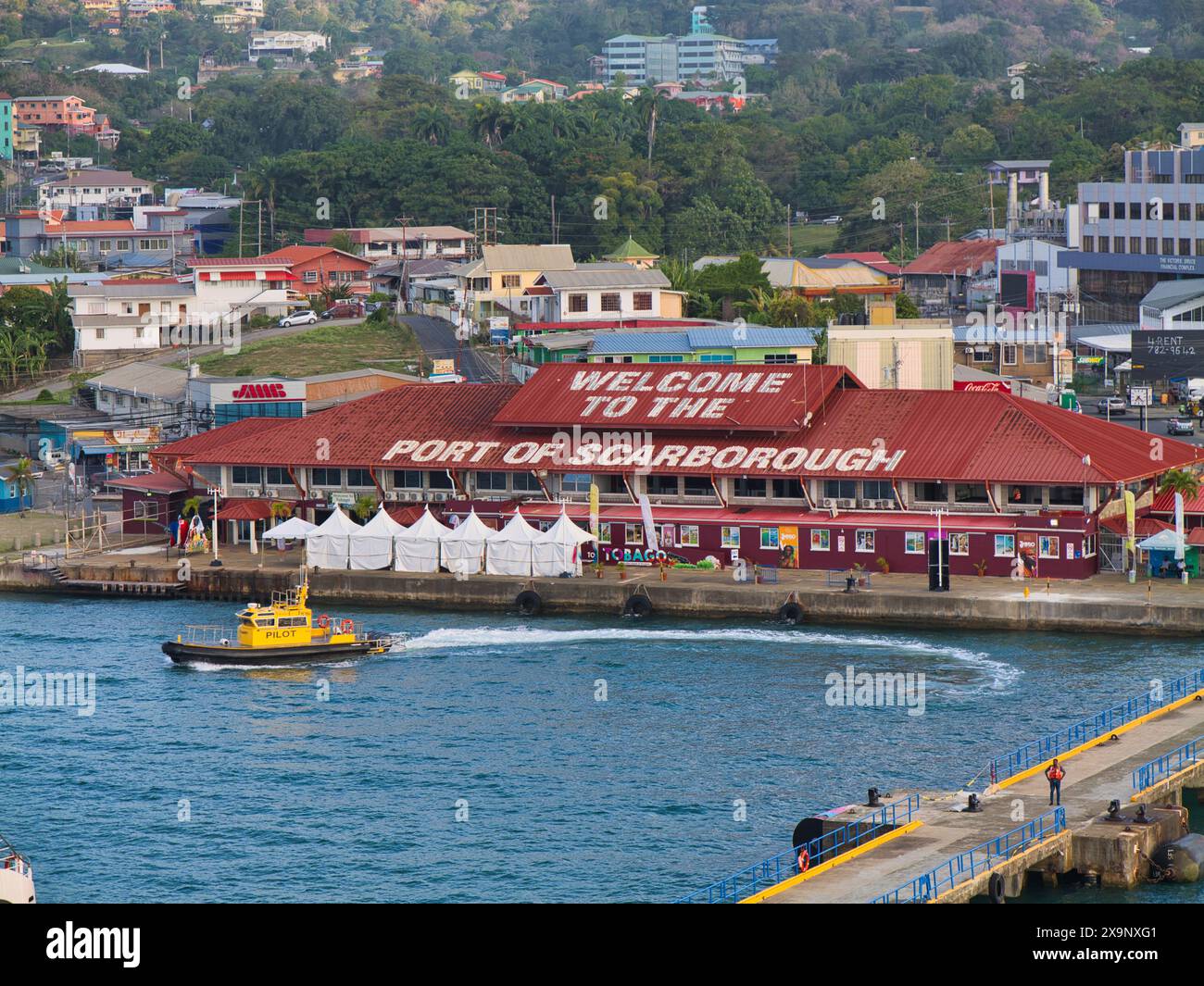 Tobago - Feb 2 2024: The Port of Scarborough buildings on the Caribbean ...