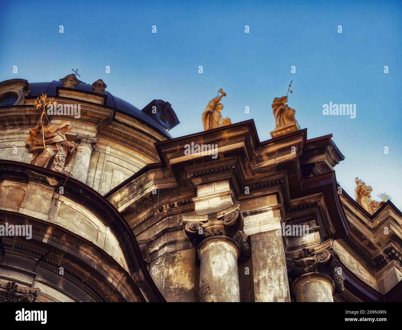 Religious Heritage: Ornate church exterior with sculptures and golden ...