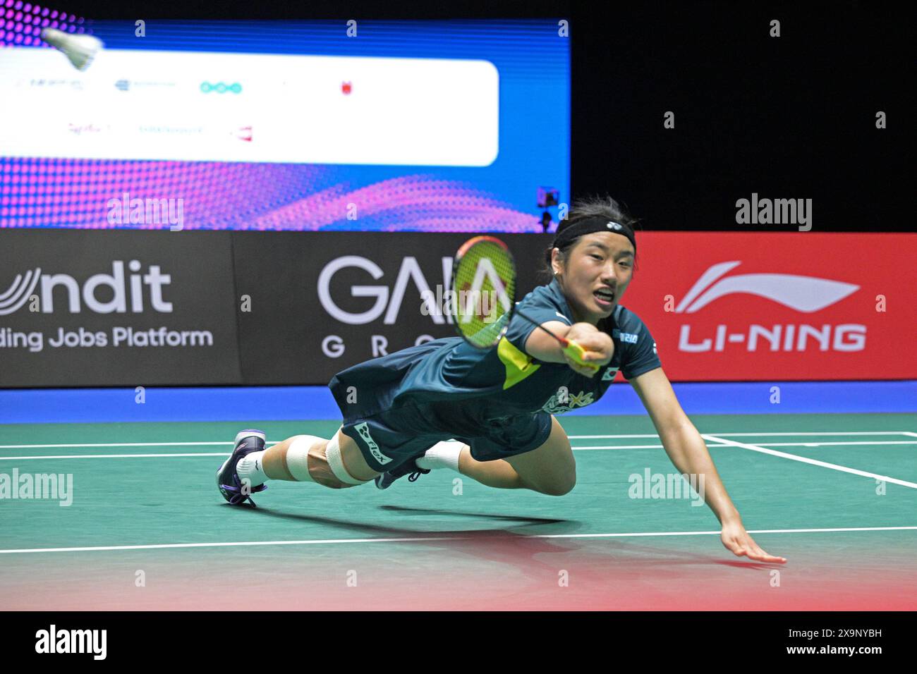 Singapore. 2nd June, 2024. An Se Young hits a return during the women's singles final between An ...