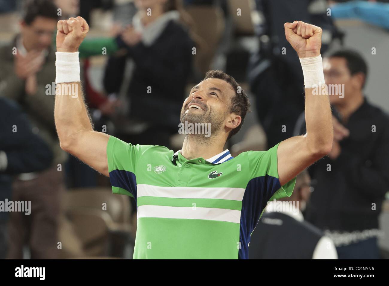 Grigor Dimitrov of Bulgaria celebrates his third round victory during ...