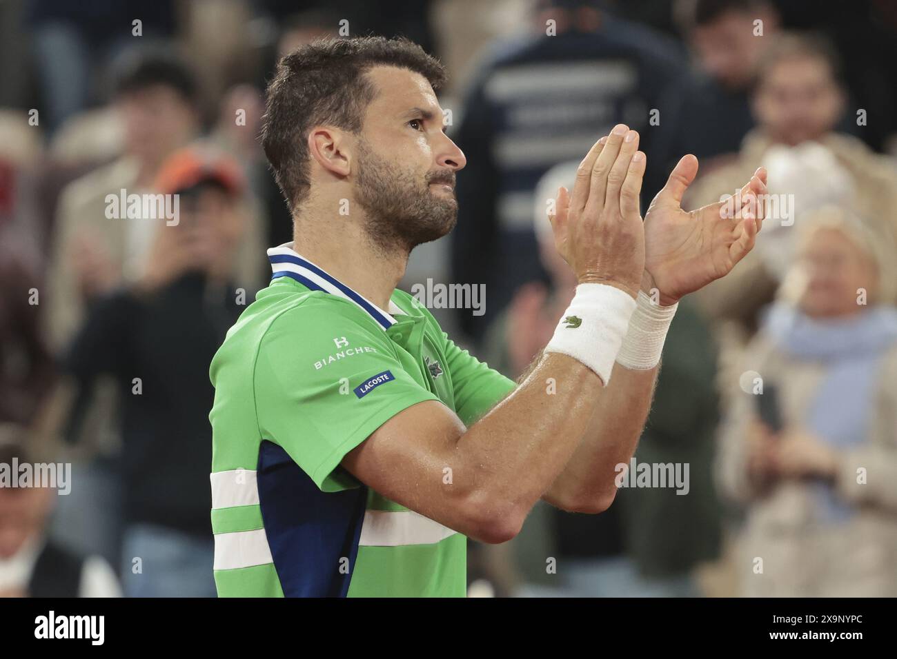 Grigor Dimitrov of Bulgaria celebrates his third round victory during ...