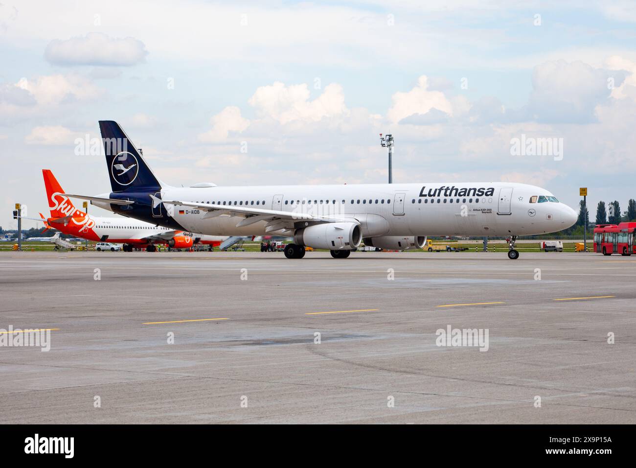 Passenger plane of the German airline Lufthansa D-AIDB. Airport apron ...