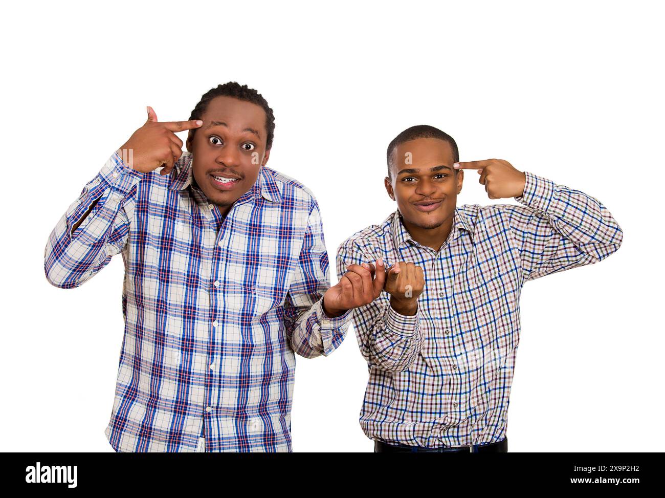 Closeup portrait two rude, difficult, angry young men gesturing with ...