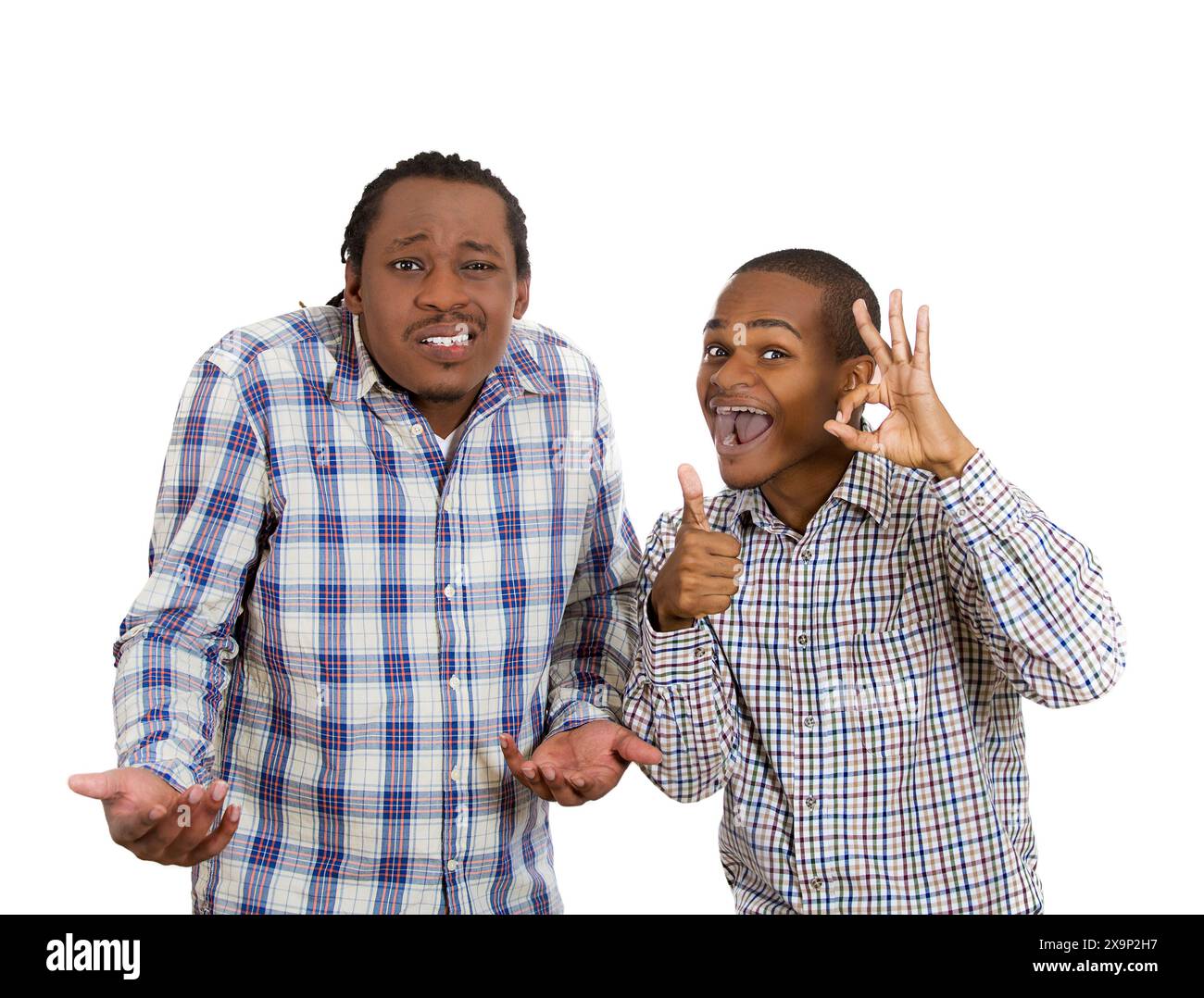 Closeup portrait two men, workers friends, one being arrogant ...