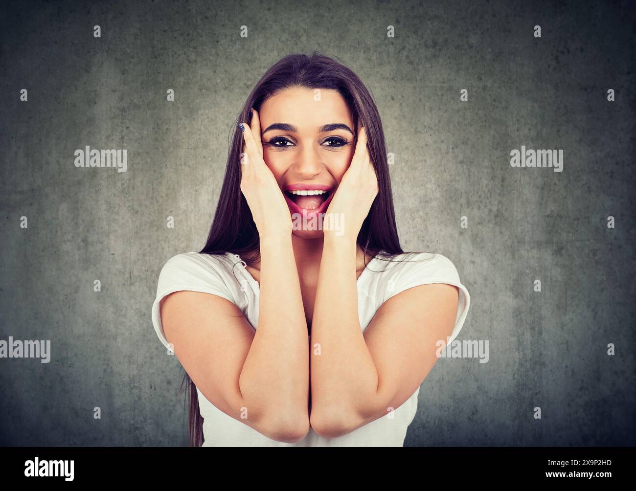 portrait of happy cute young beautiful woman looking excited, surprised ...