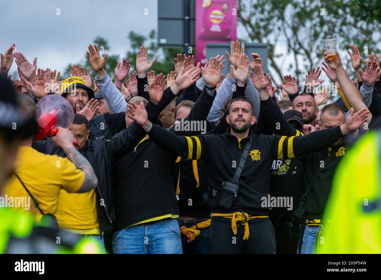 London, UK. 1st June, 2024. Borussia Dortmund ultras march to Wembley ...