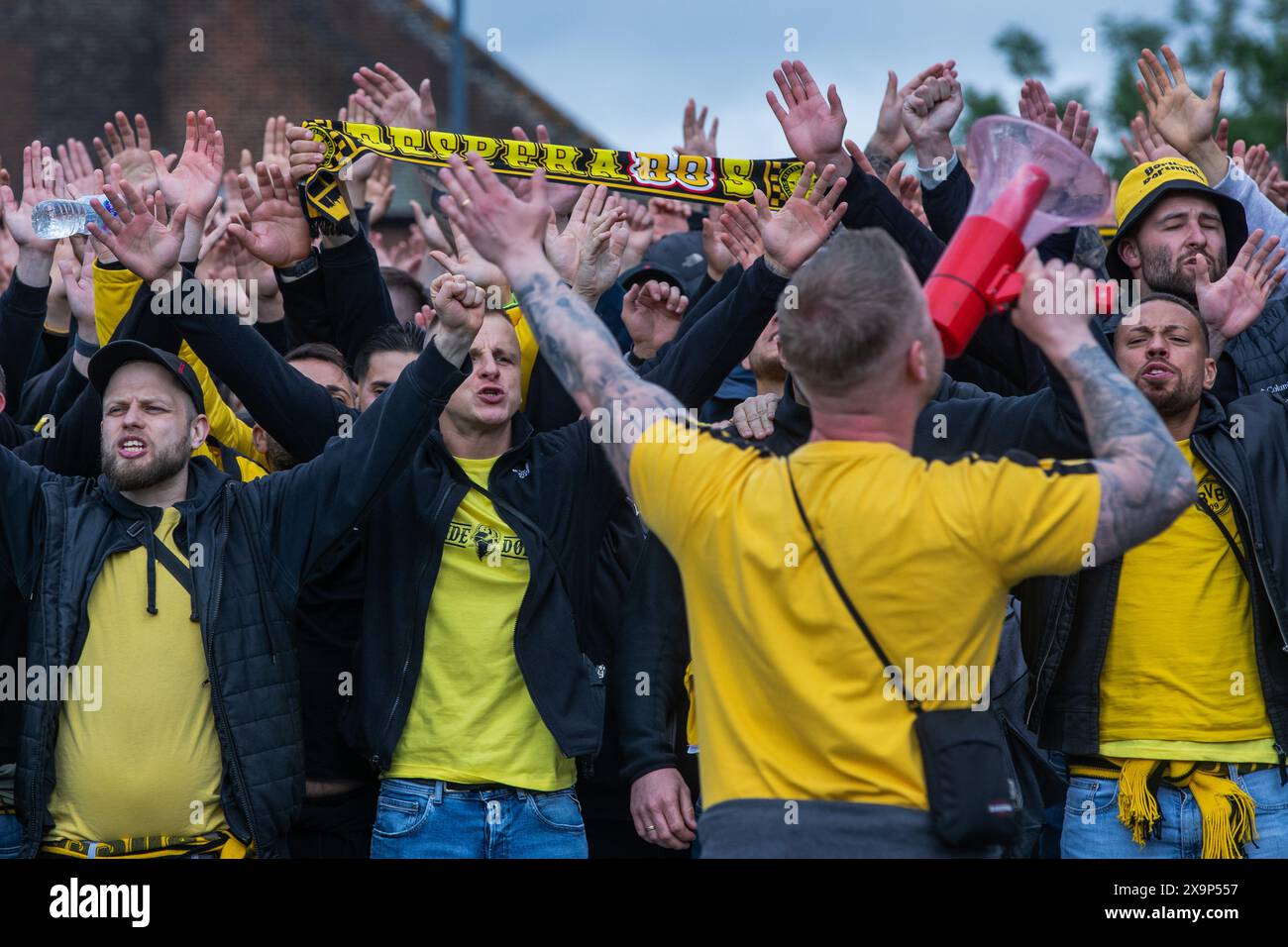 London, UK. 1st June, 2024. Borussia Dortmund ultras march to Wembley ...