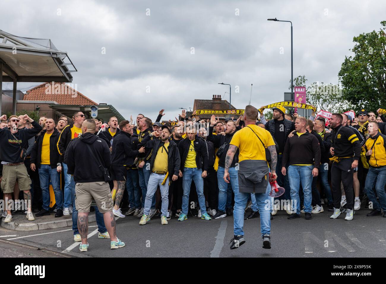 London, UK. 1st June, 2024. Borussia Dortmund ultras march to Wembley ...