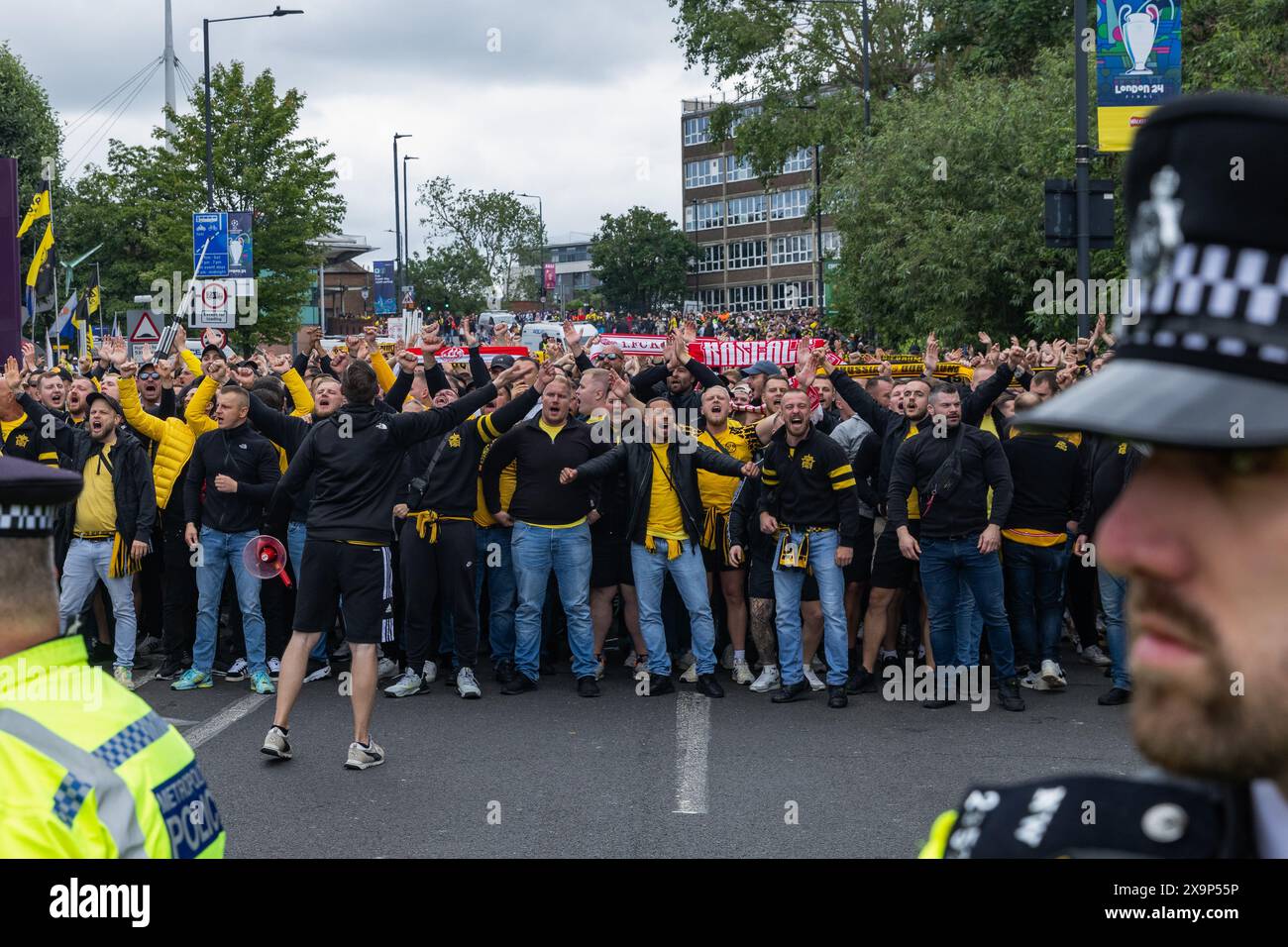 London, UK. 1st June, 2024. Borussia Dortmund ultras march to Wembley ...