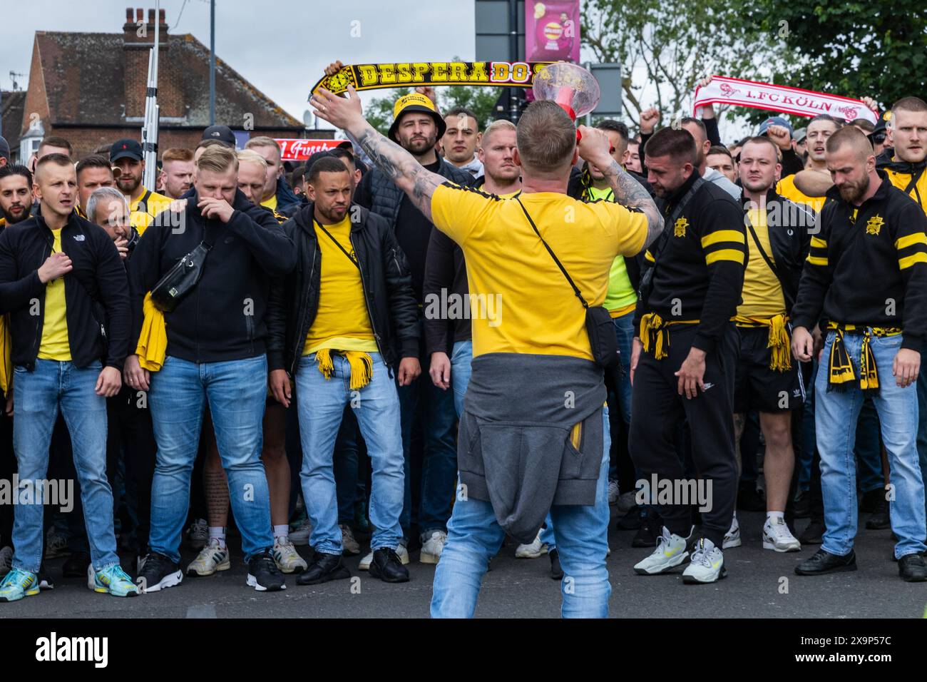 London, UK. 1st June, 2024. Borussia Dortmund ultras march to Wembley ...