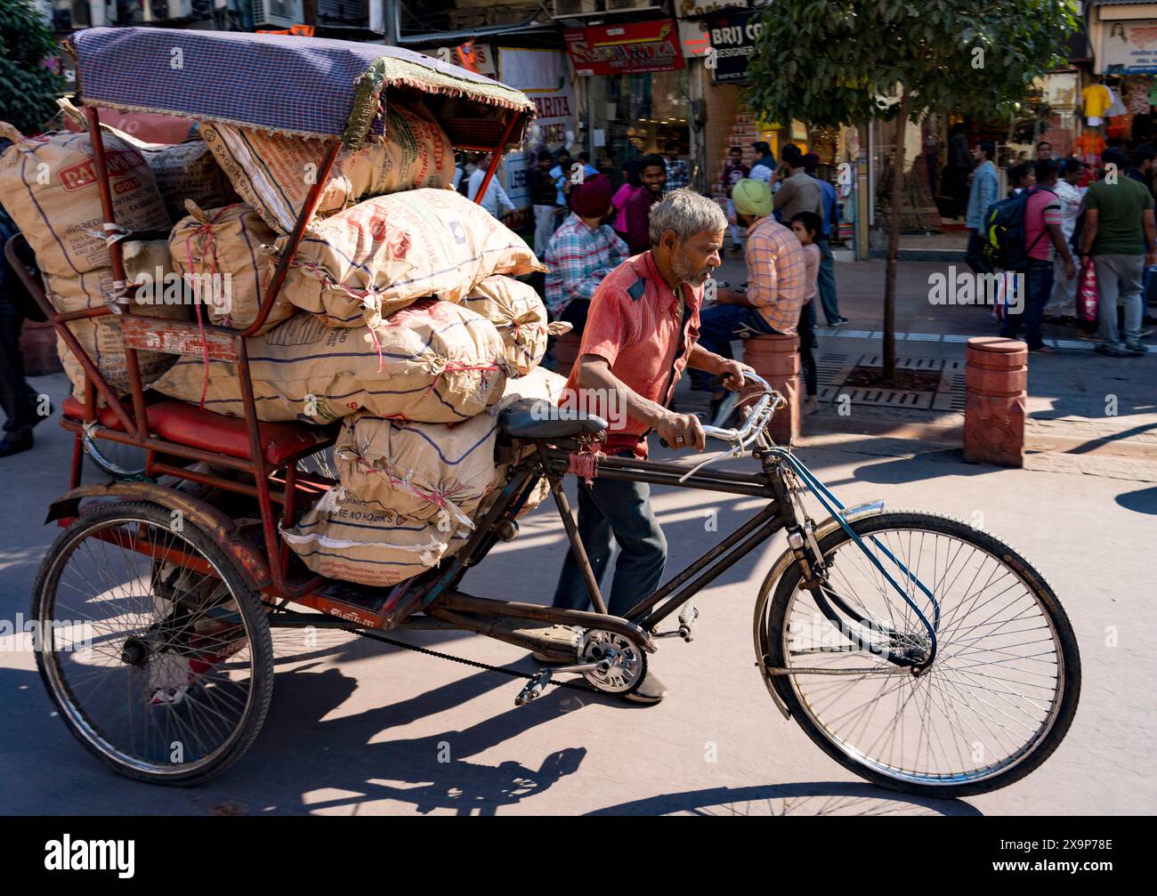 Heavy loaded rickshaw hi-res stock photography and images - Alamy
