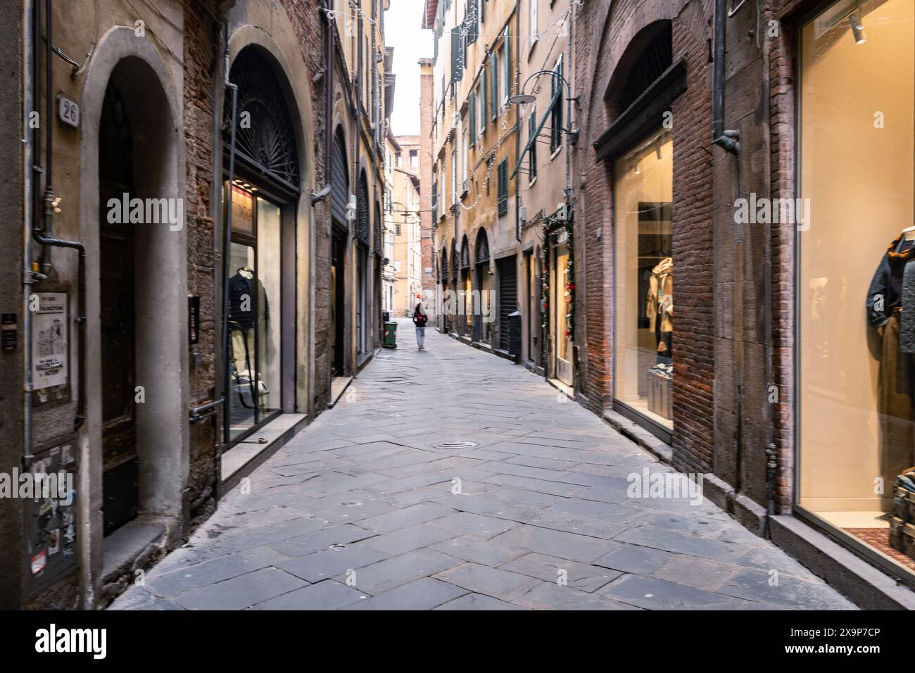 the old street of the old town of Lucca with the medieval architecture ...