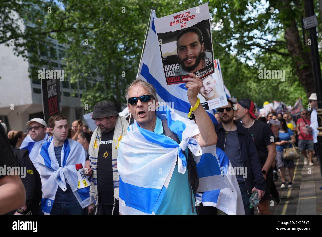 People take part during a Bring Hostages Home event in central London ...