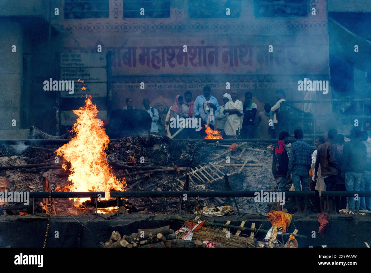 Openair cremation ritual at a nepali ghats with mourners and ceremonial ...