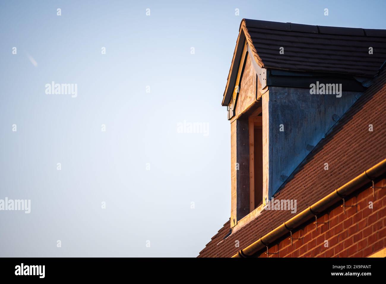 Loft window view of construction building site in england uk Stock ...
