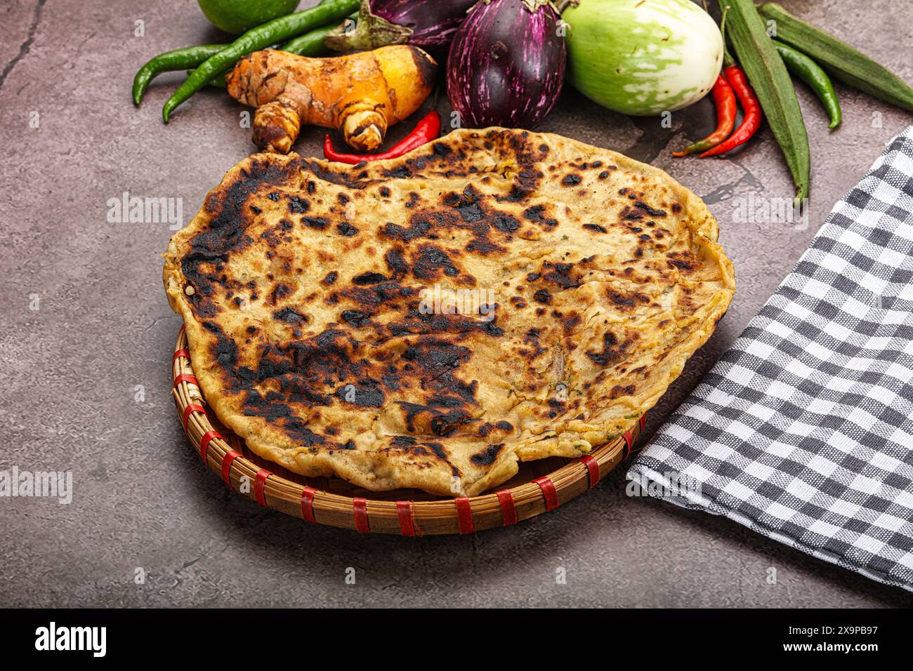 Indian cuisine stuffed Aloo paratha - bread with potato Stock Photo - Alamy