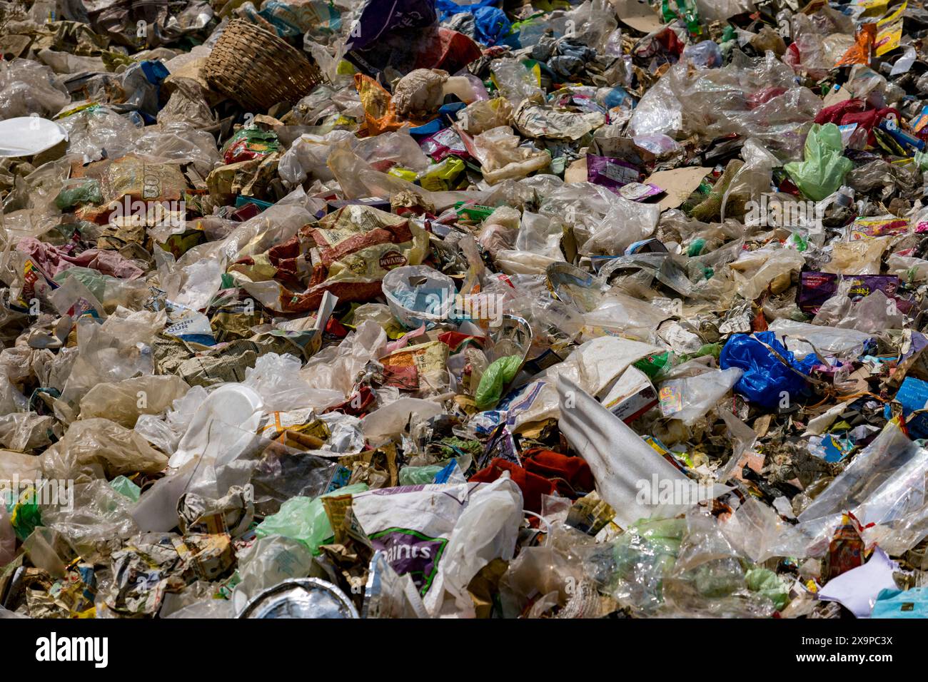 Closeup of a large accumulation of unsorted trash and debris at a ...