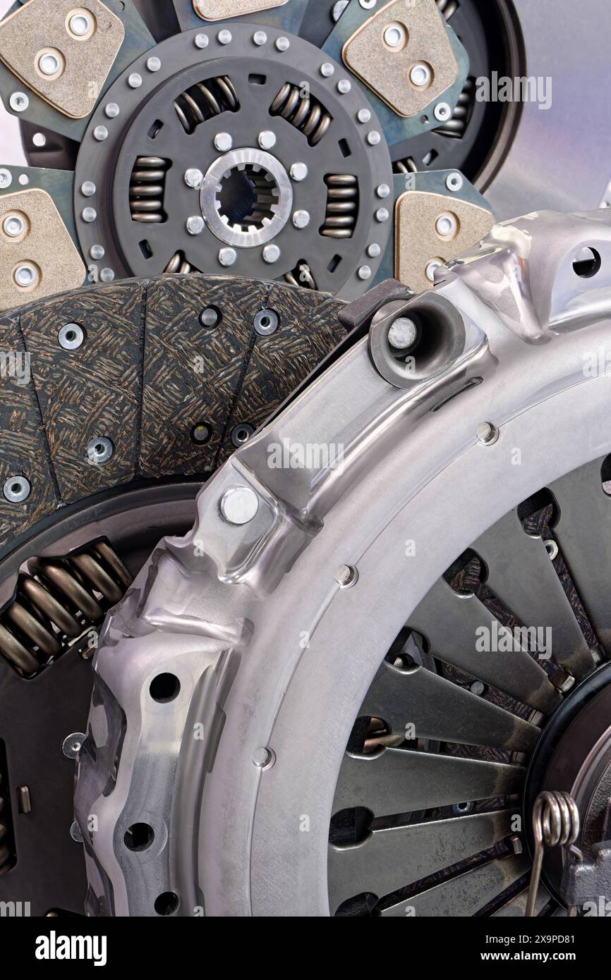 Car spare parts, engine clutch kit, industrial background Stock Photo ...