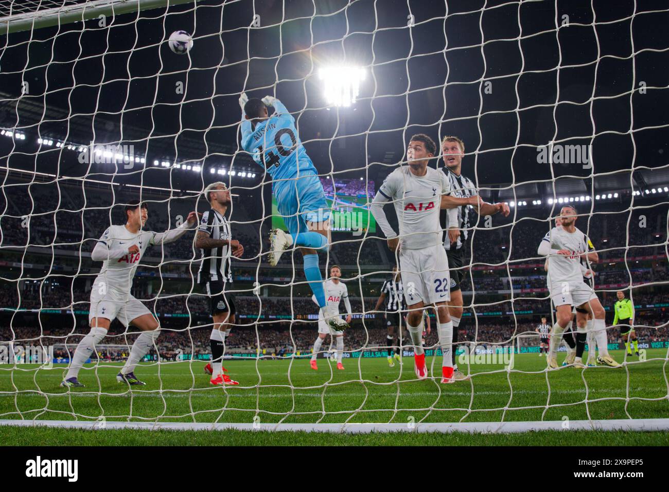 Goalkeeper, Brandon Austin of Tottenham jumps to push the ball during ...