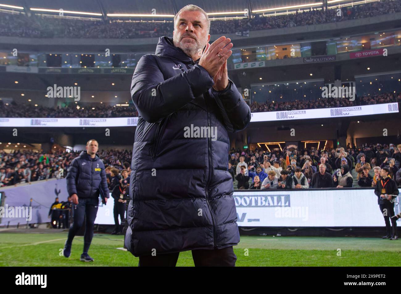 Coach, Ange Postecoglou of Tottenham walks onto the pitch before the ...