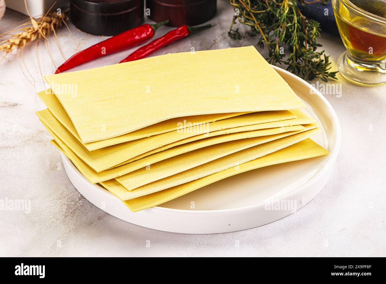 Italian cuisine - dry lasagna sheets for cooking Stock Photo - Alamy