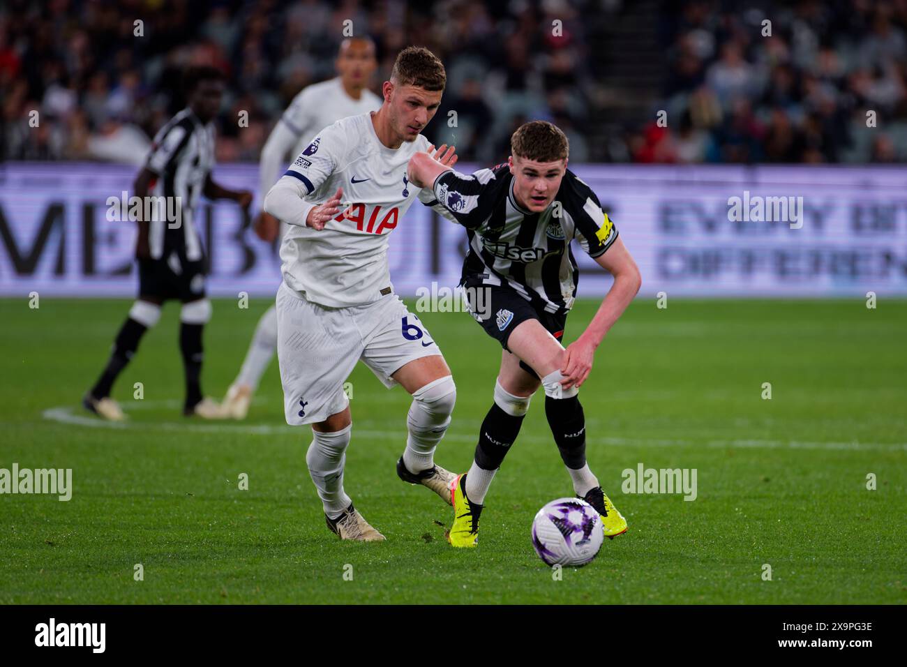Alex Murphy of Newcastle competes for the ball with Jamie Donley of ...
