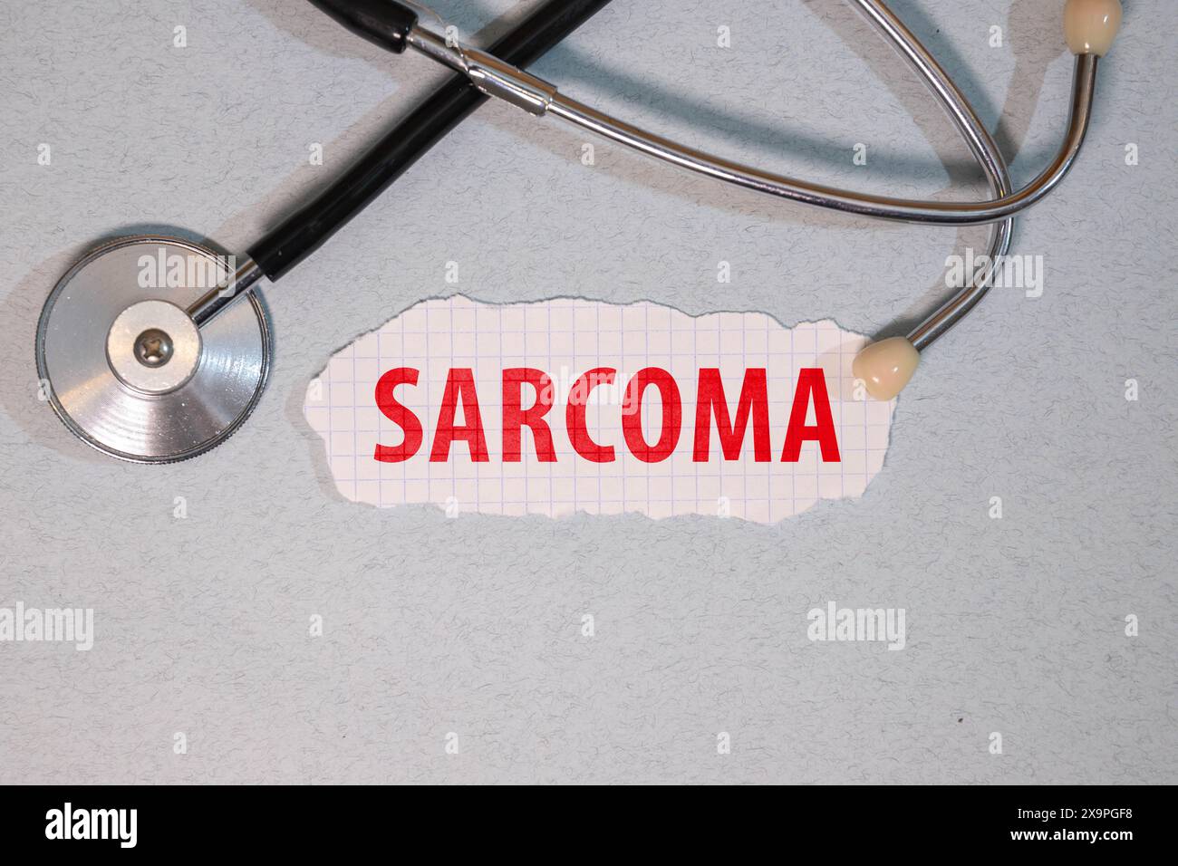 SARCOMA word on a notebook with medical equipment on background Stock ...