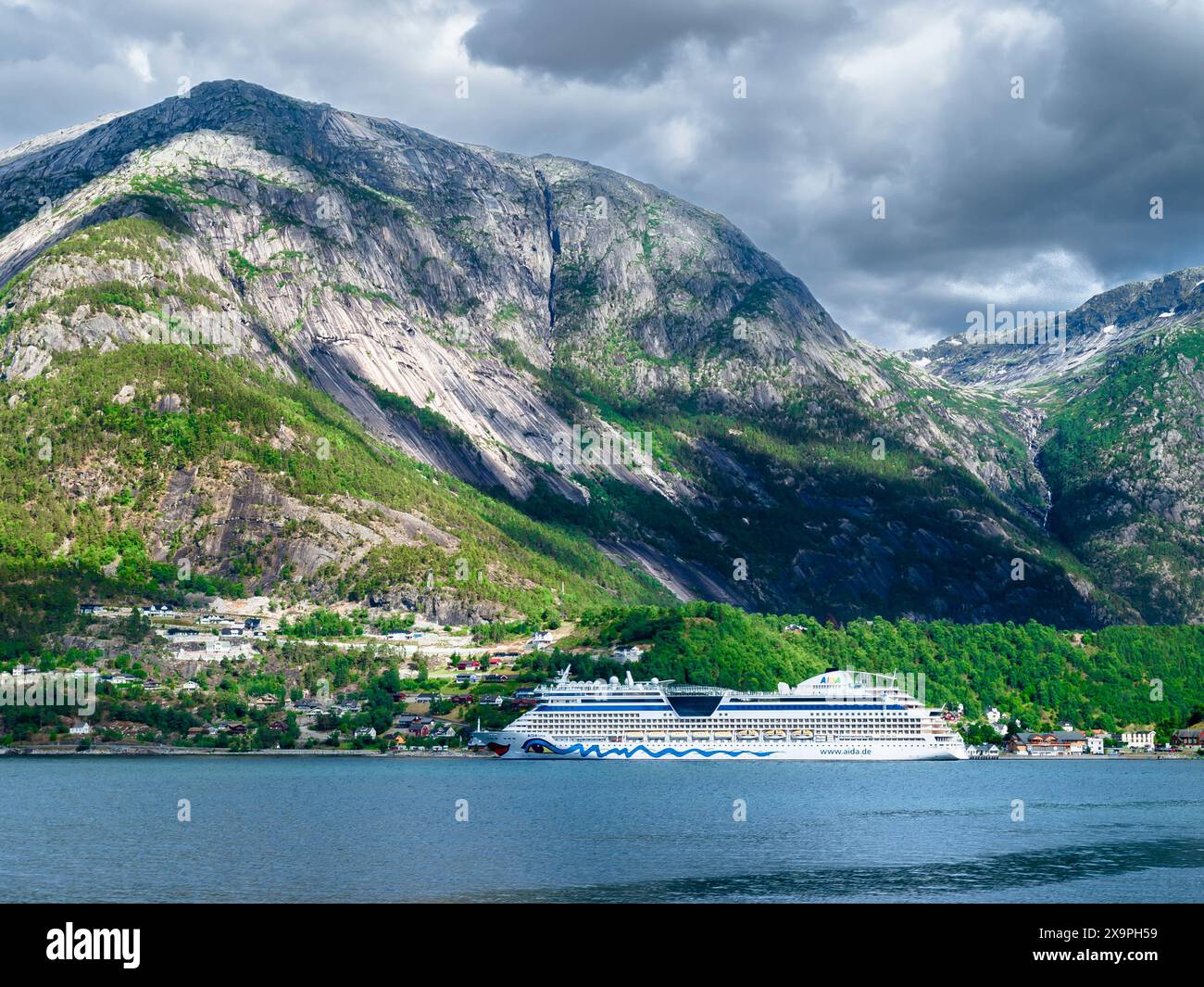 cruise ship floating on the fjord Stock Photo - Alamy