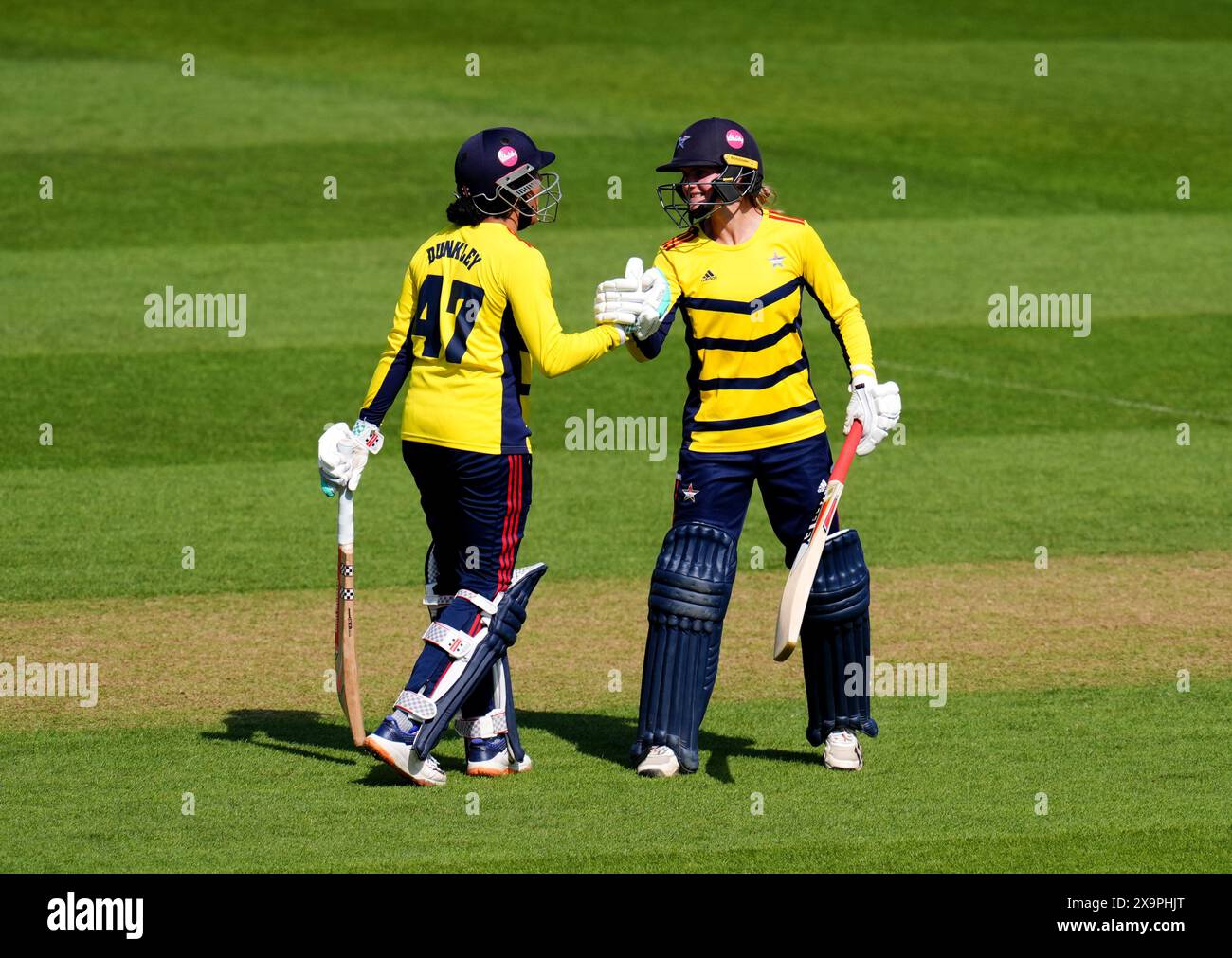 South East Stars' Paige Scholfield (right) celebrates with team-mate ...