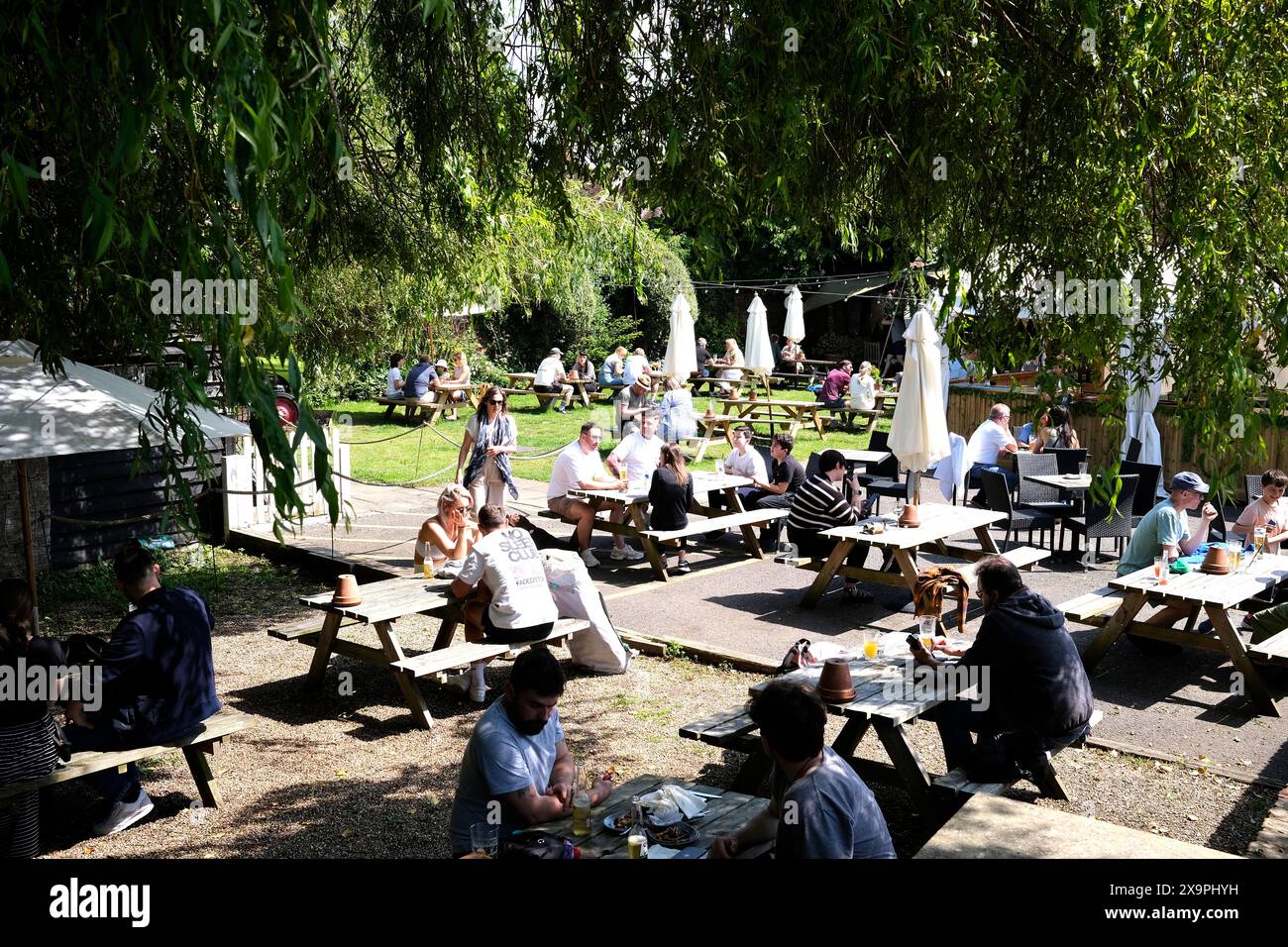 people having outdoor refreshments in local pub,fordwich village,sturry ...