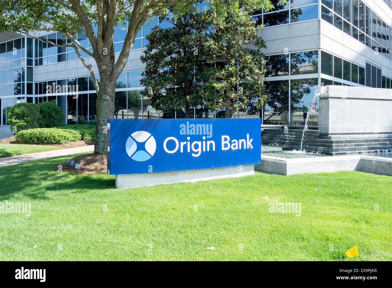 Houston, Texas, USA - April 14, 2024: An Origin Bank ground sign at one ...
