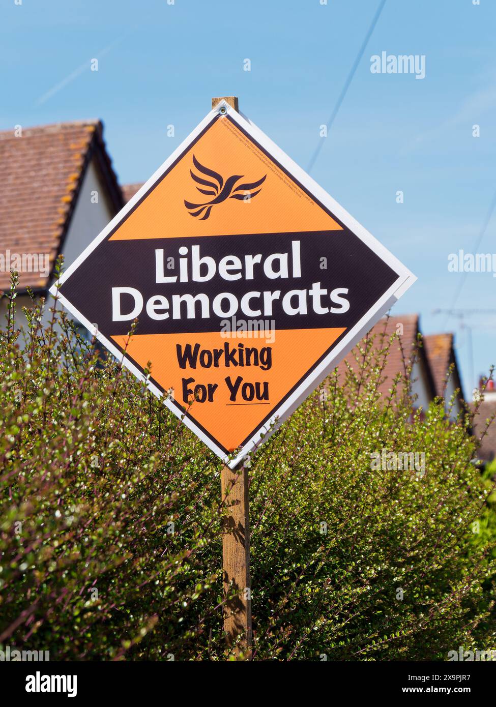 Liberal Democrats party 'Working For You' logo and slogan on signpost ...
