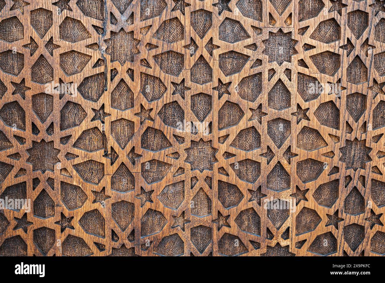 arabic Uzbek Islamic patterns ornament with stars on wooden carved door ...