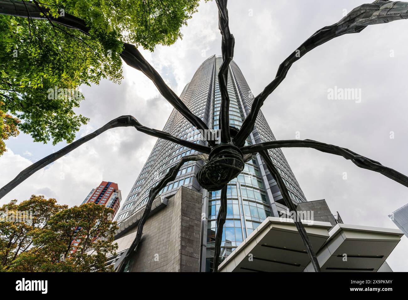 Underneath, view up at the body of the Maman spider sculpture outside ...