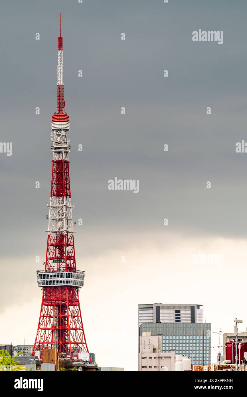 The iconic red and white Tokyo tower on the city skyline against an ...
